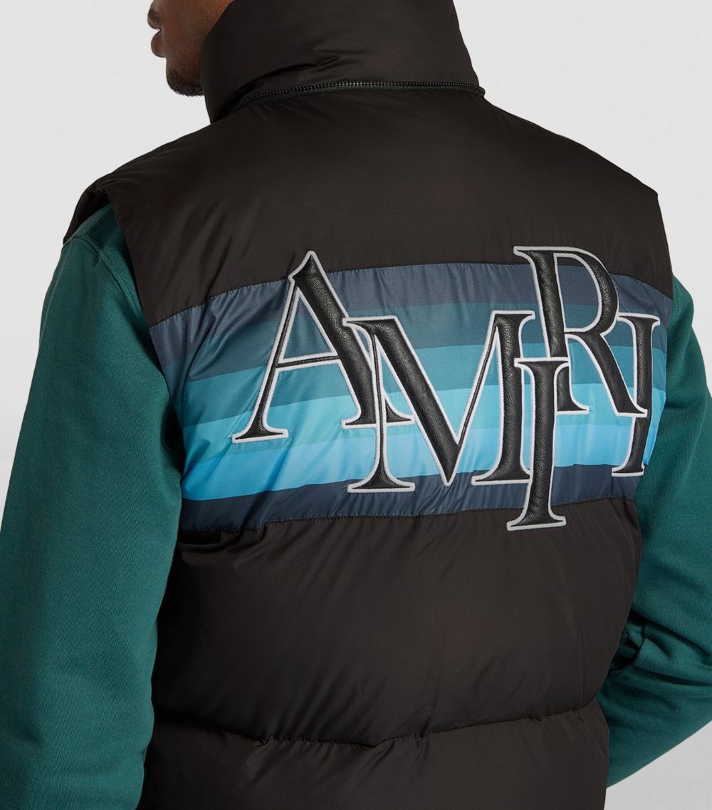 AMIRI Staggered Logo Puffer Jacket | REVERSIBLE