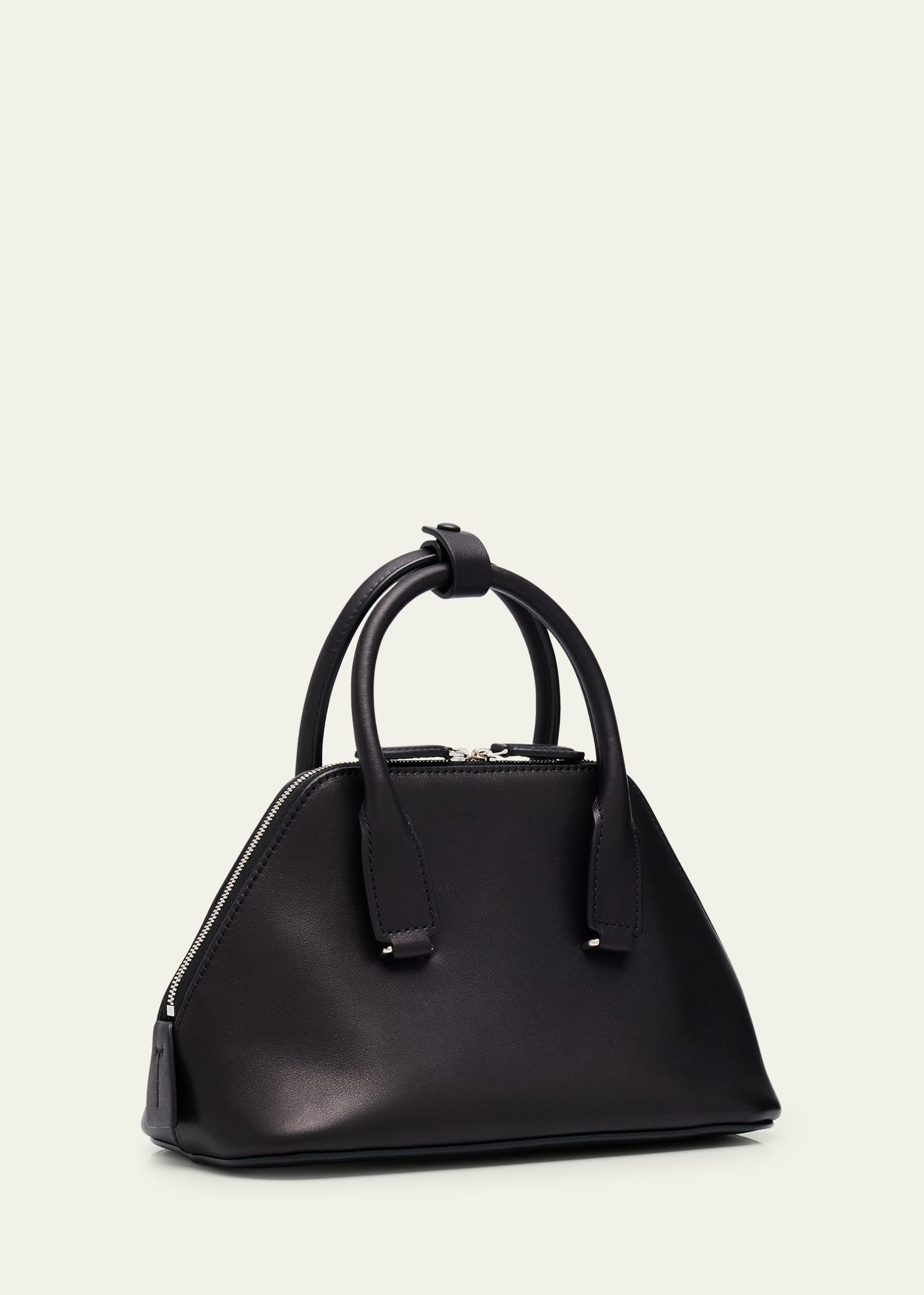 The Row Devon Mini Top-Handle Bag in Saddle Leather | bergdorfgoodman | REVERSIBLE