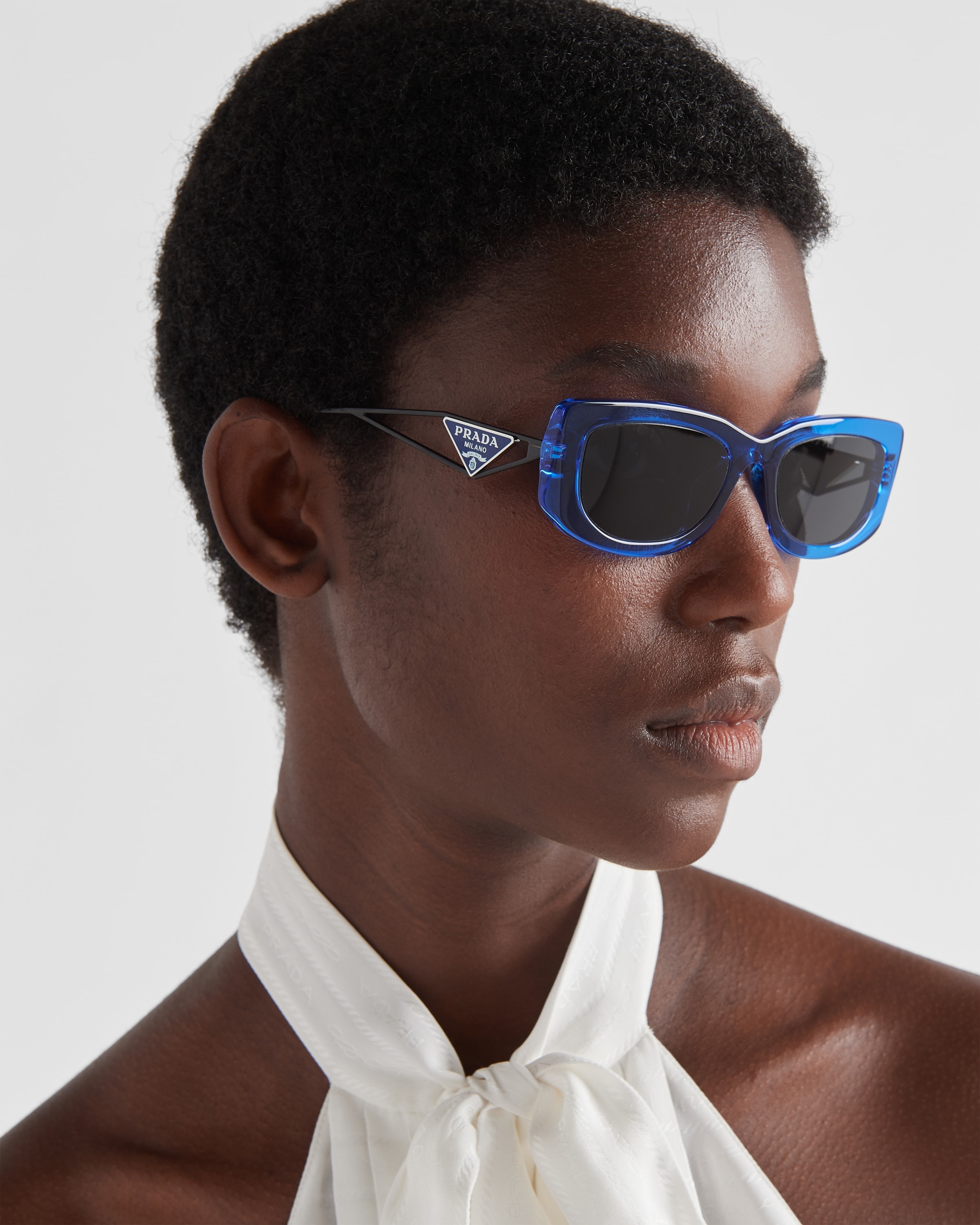 Prada Sunglasses with triangle logo | REVERSIBLE Prada Sunglasses with triangle logo | REVERSIBLE