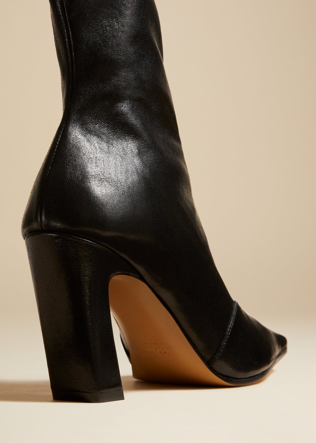KHAITE The Dallas Stretch Ankle Boot in Black Leather | REVERSIBLE
