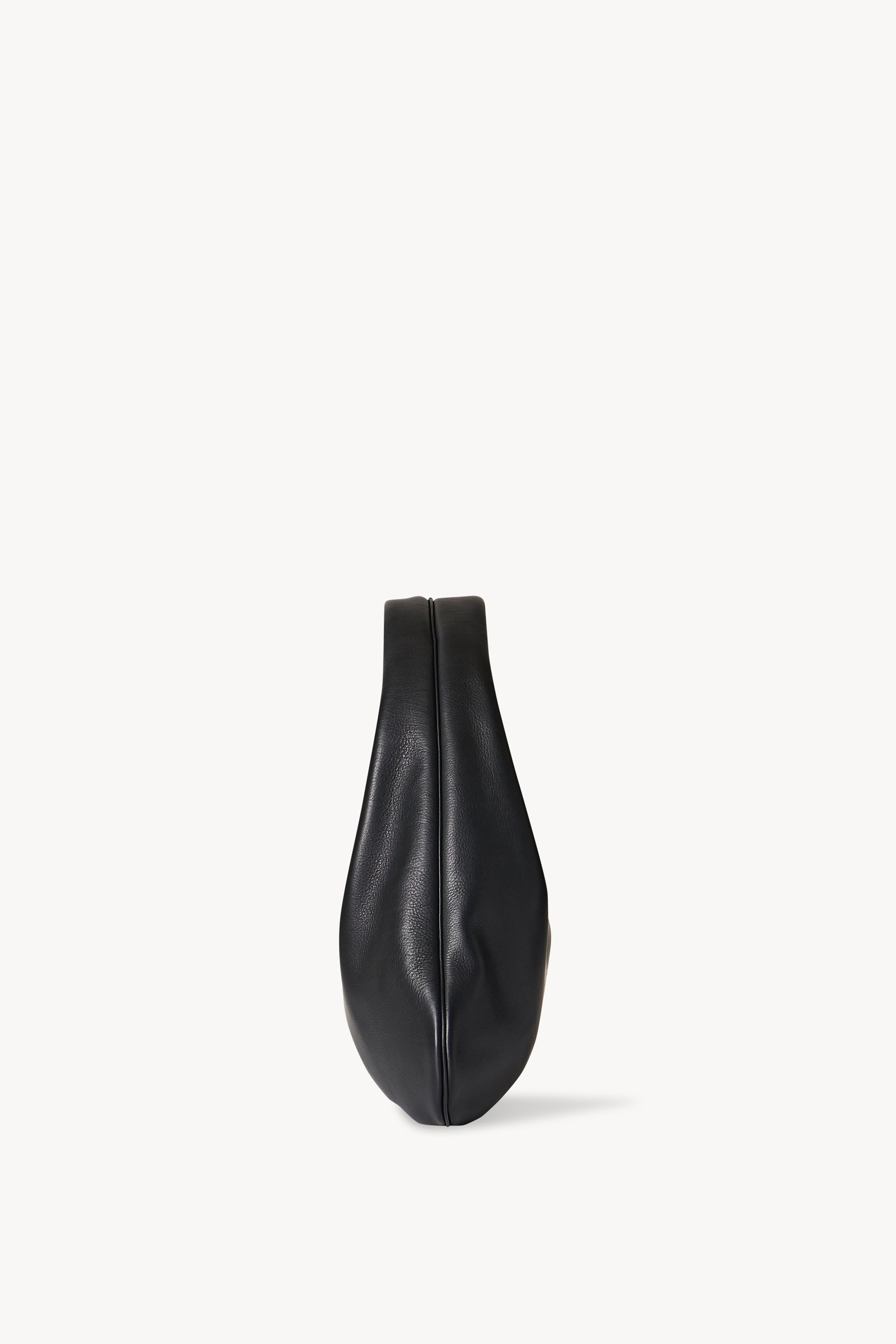 The Row Small Everyday Shoulder Bag in Leather | REVERSIBLE